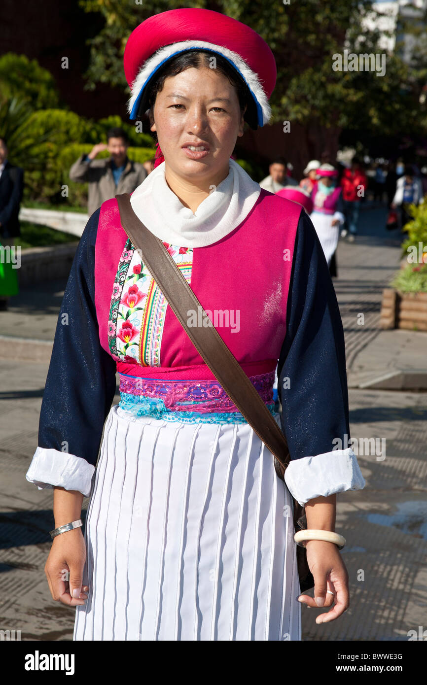 Woman wearing traditional Tibetan costume, Lijiang, Yunnan Province ...
