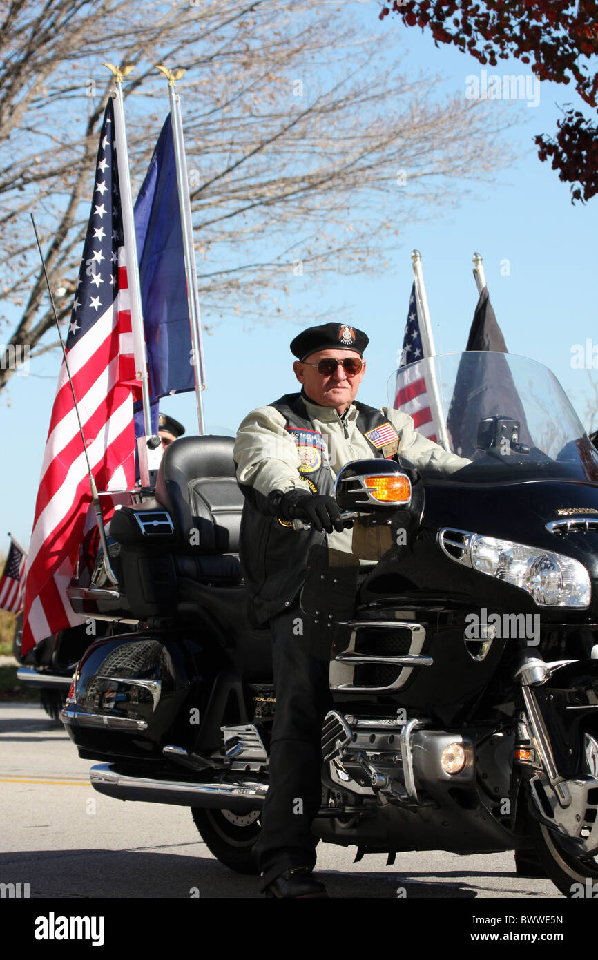 A US veteran riding his motorcycle in the Veterans Day Parade Milwaukee ...