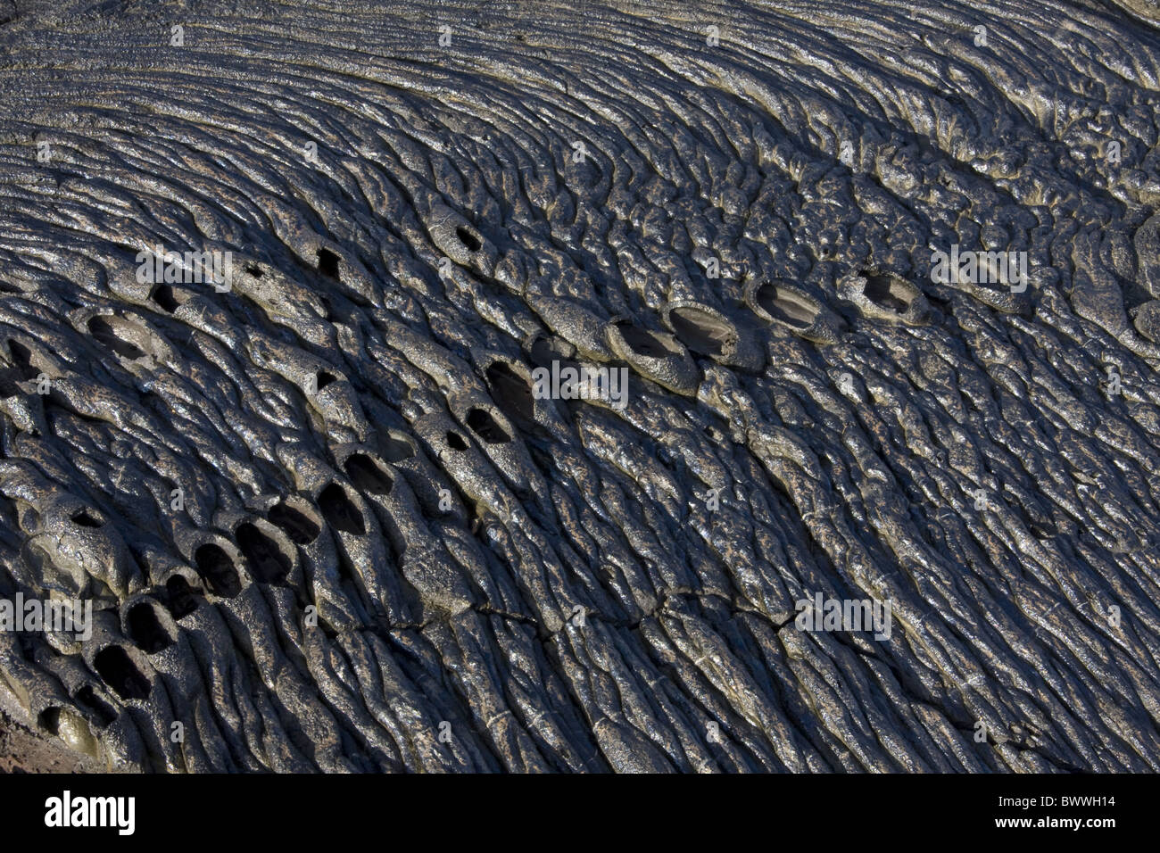 Pahoehoe lava is result magma containing very Stock Photo - Alamy