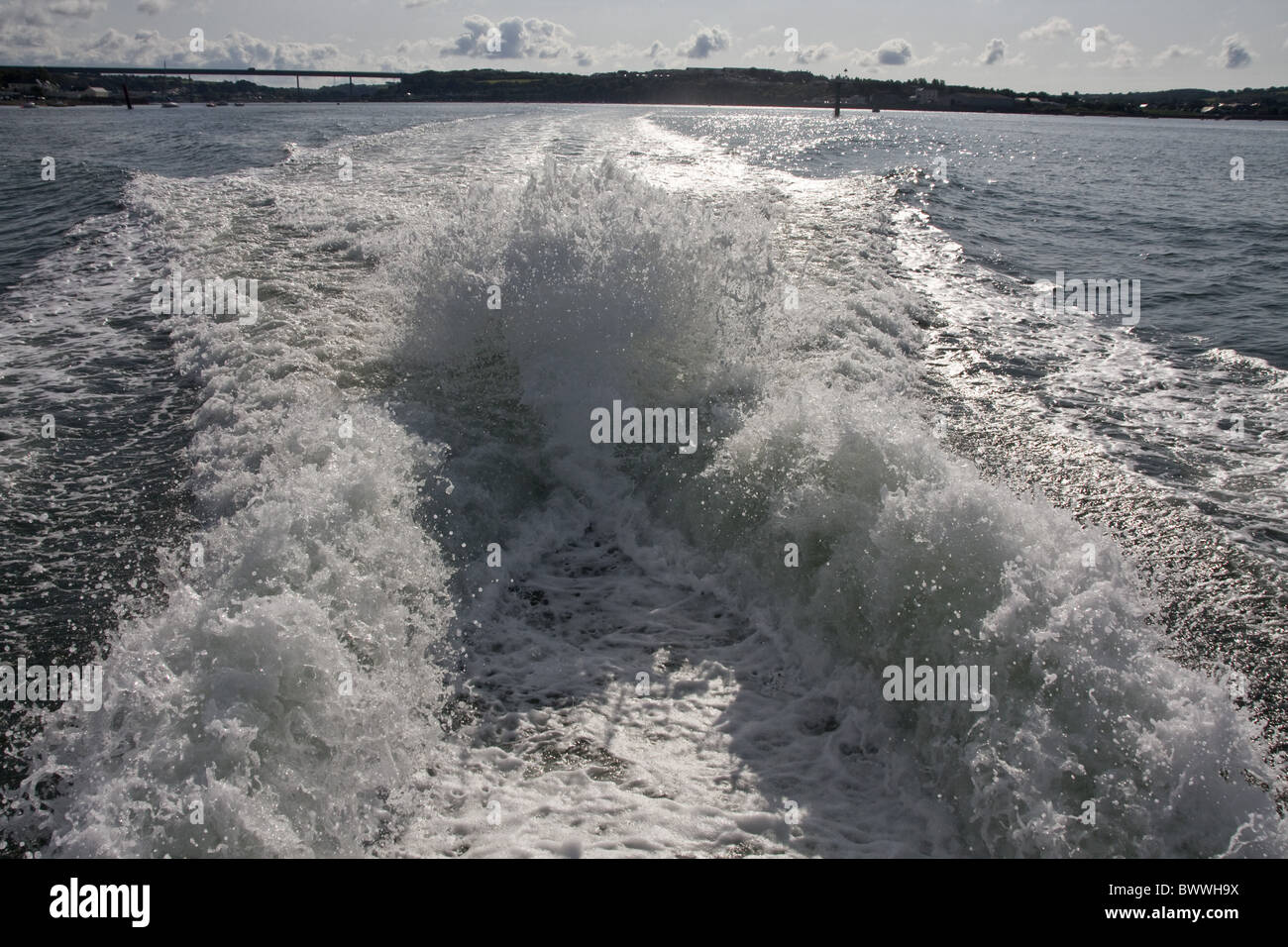 the wake behind speed boat can do lot damage Stock Photo - Alamy