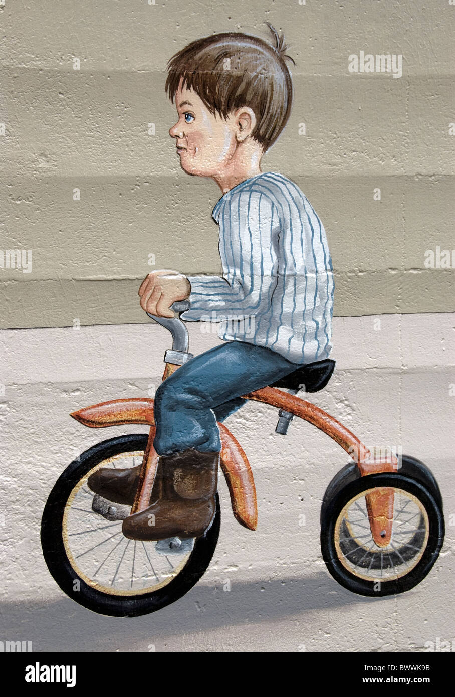 Mural of boy on a tricycle. Released by the artist but in moving I'm ...