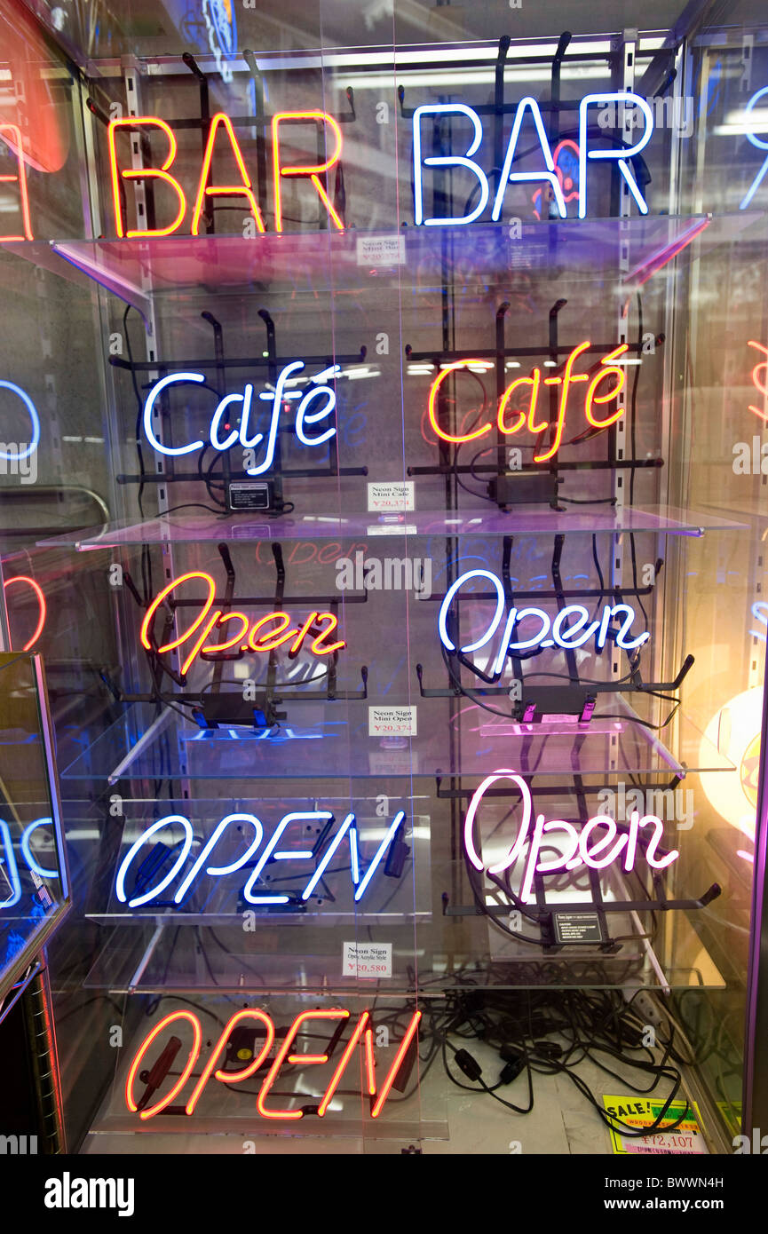 Neon shop signs are displayed at Shimura Seisakusho, a shop ...