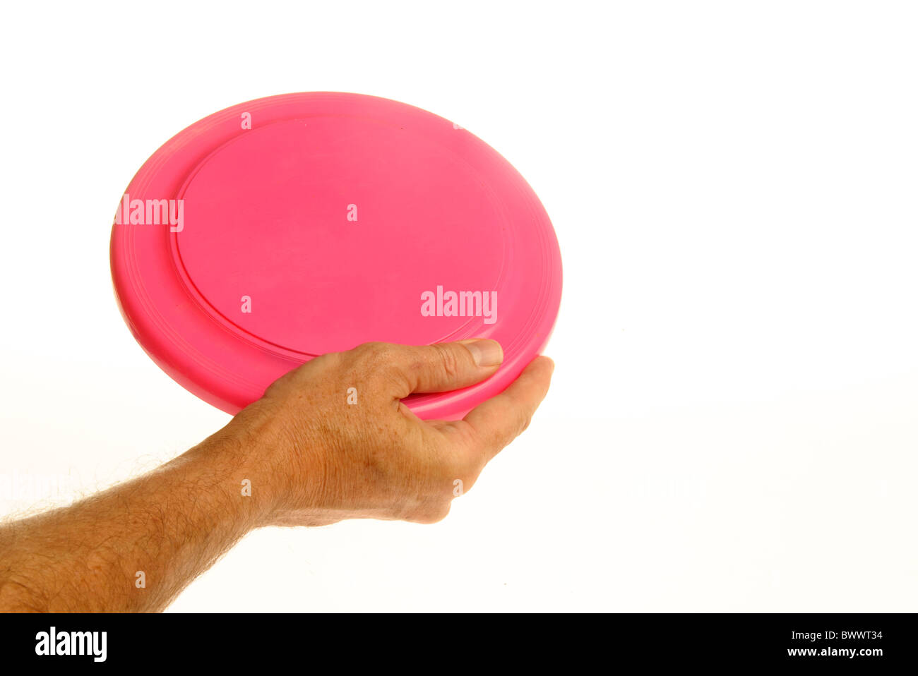 hand throwing a frisbee Stock Photo - Alamy