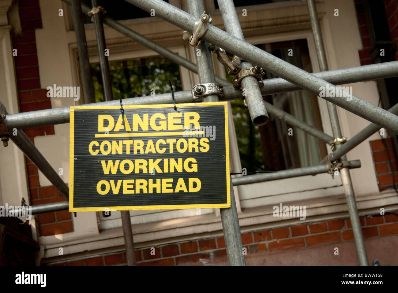 danger contractors working overhead sign Stock Photo - Alamy