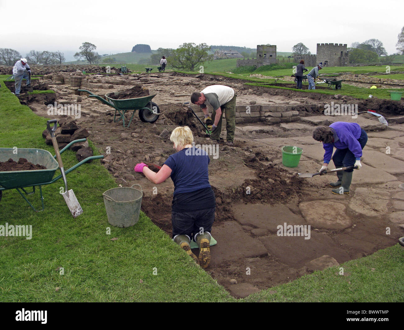 Archeological dig people working site Housesteads Stock Photo - Alamy