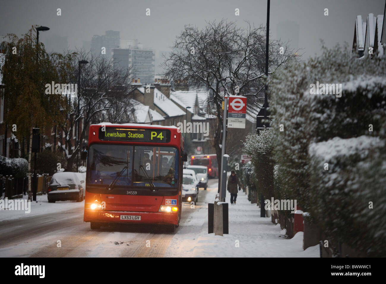 A P4 bus service climbs Herne Hill early after fresh overnight snowfall ...