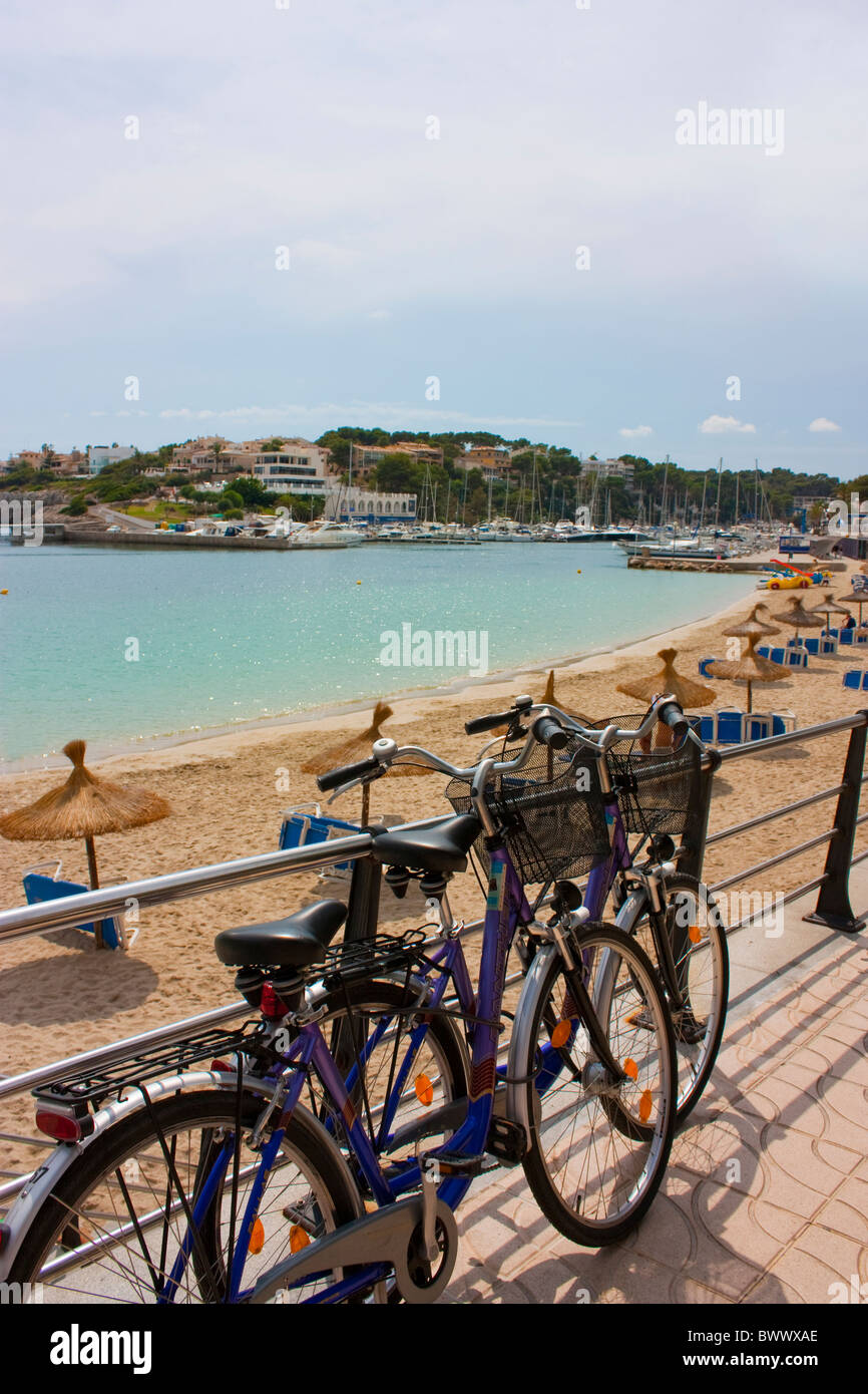 biking holiday, bikes ta beach in porto cristo in majorca Stock Photo ...