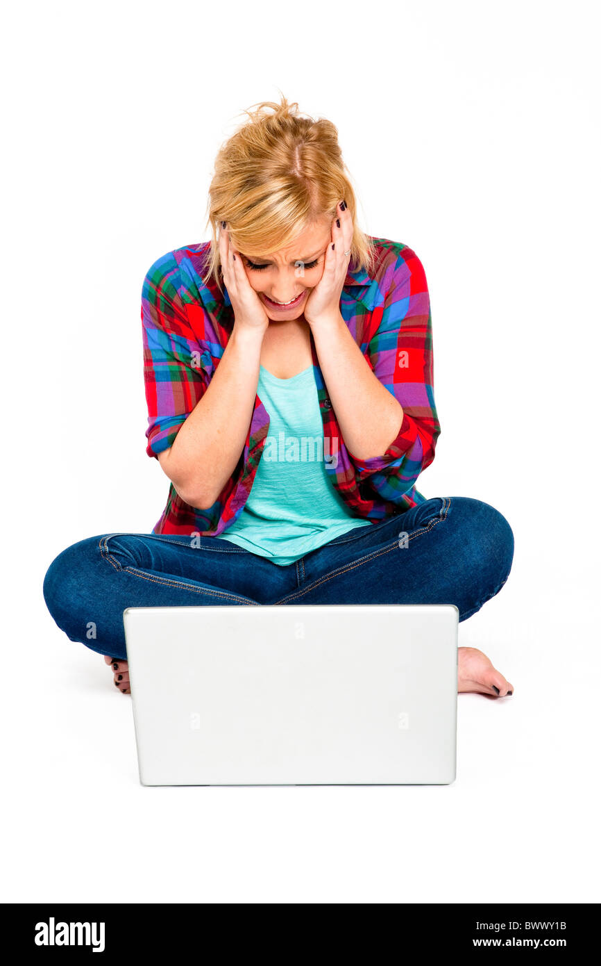 Beautiful Young Woman with Bad News and Computer Problems Stock Photo ...