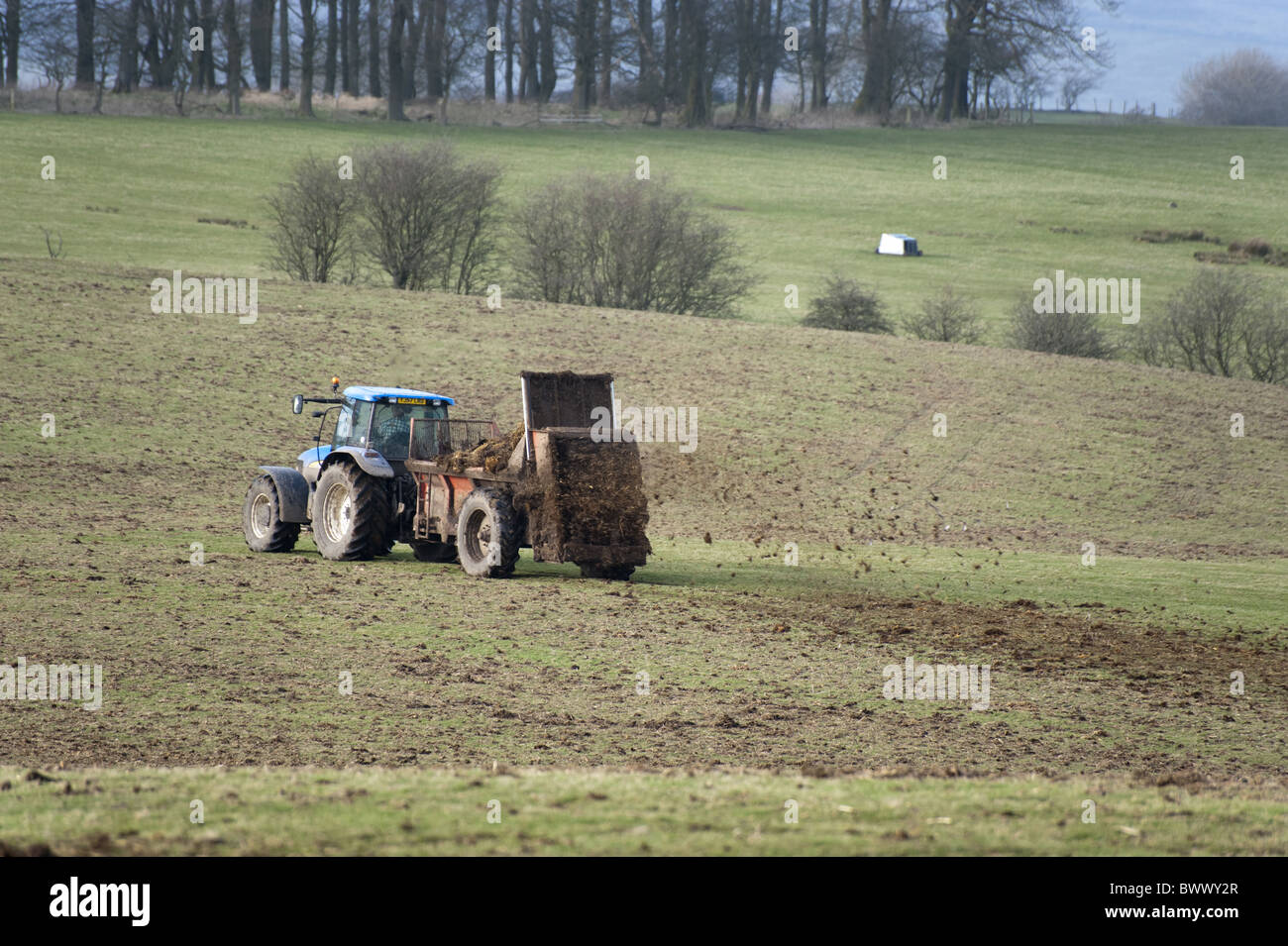 spreading fertilizer field farmyard manure farm farms farming manure ...