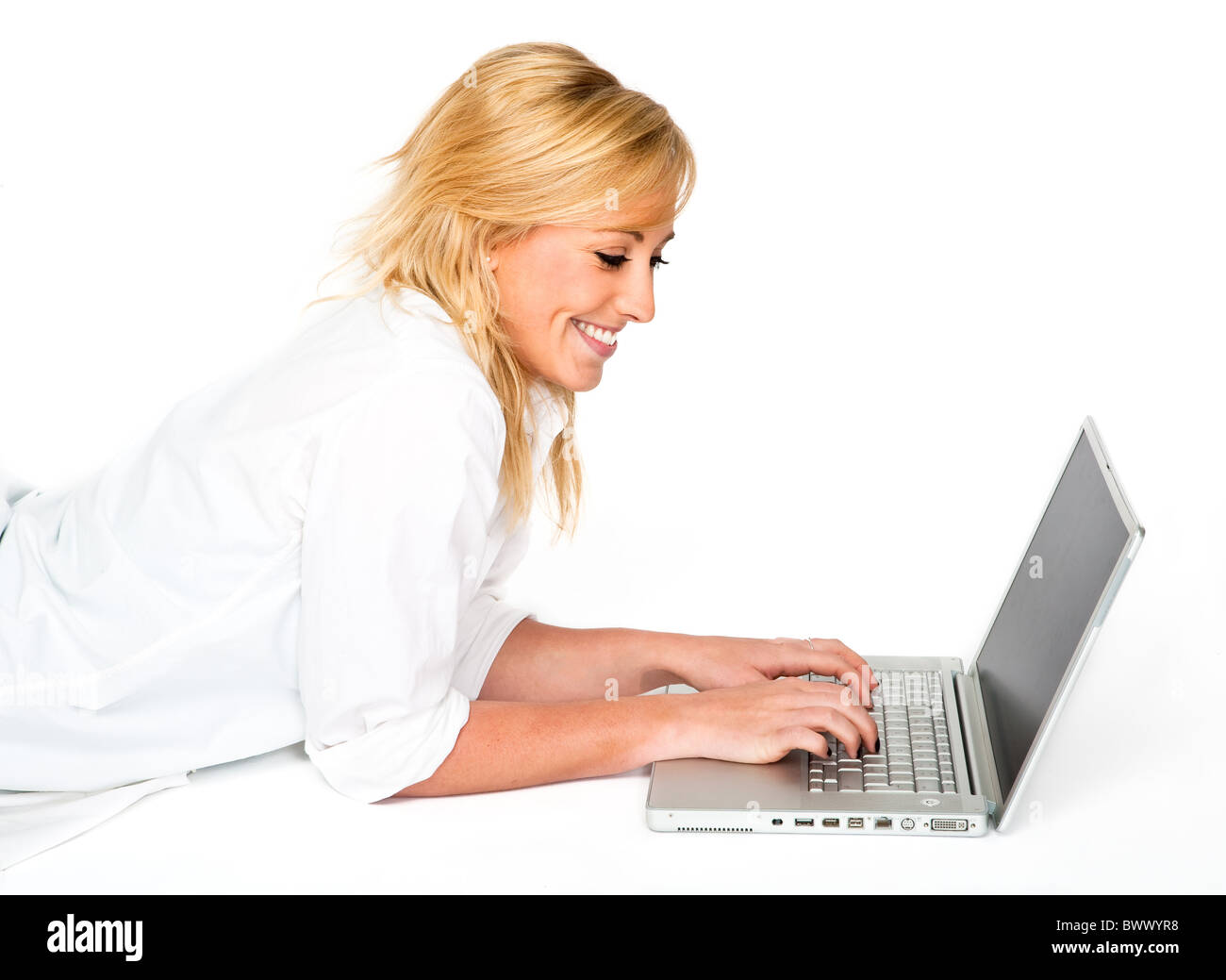 Beautiful Young Woman Smiling While Using Her Laptop Stock Photo - Alamy