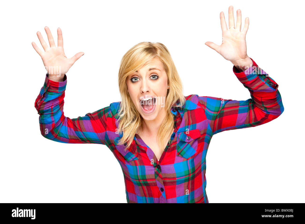 Attractive Young Woman with Hands Raised Shouting For Attention or ...