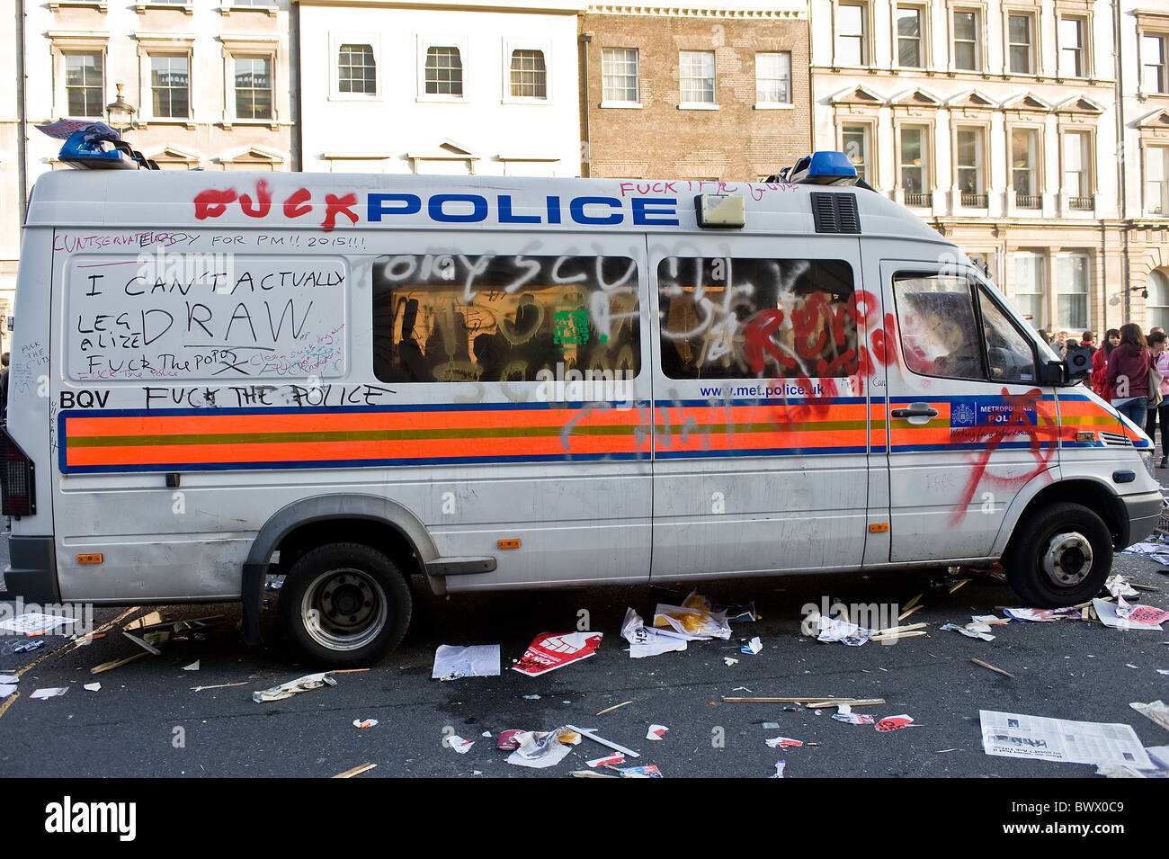 A wrecked Metropolitan police vehicle at a demonstration in London ...