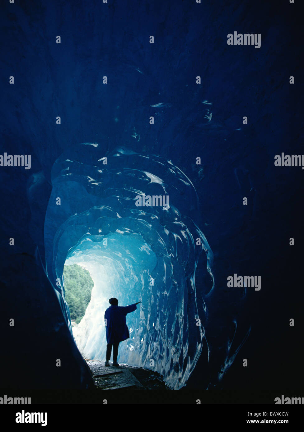 blue gleam ice ice grotto Grindelwaldgletscher inside person more high ...