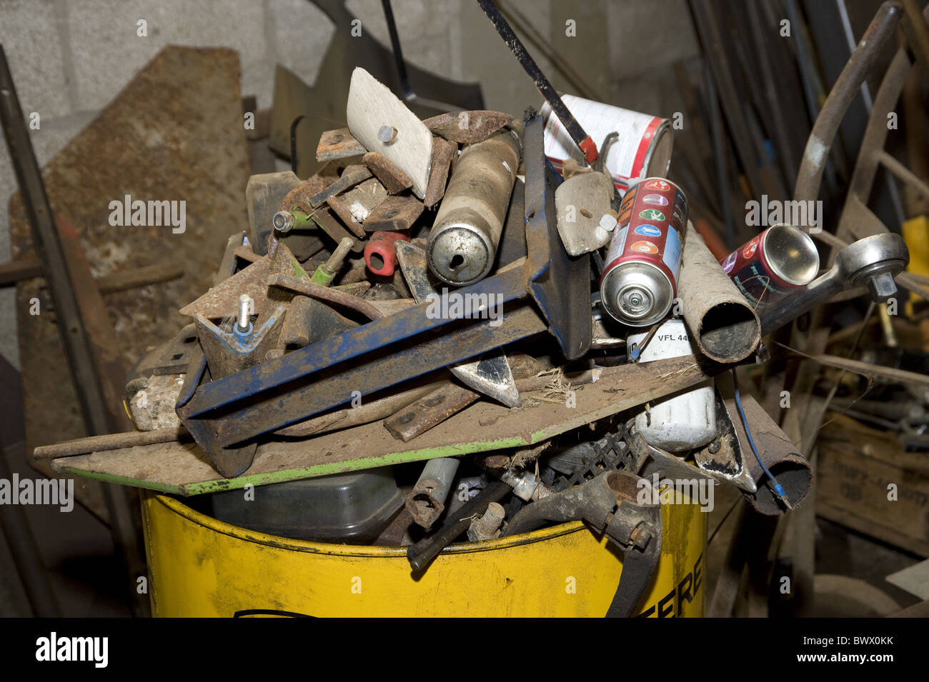 Scrap metal in farm workshop, England Stock Photo - Alamy