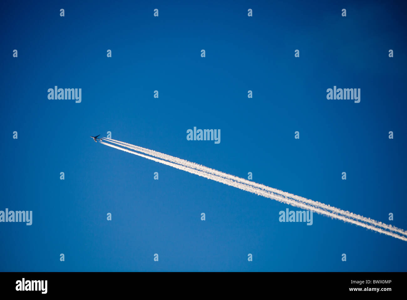 Airplane trail emissions hi-res stock photography and images - Alamy