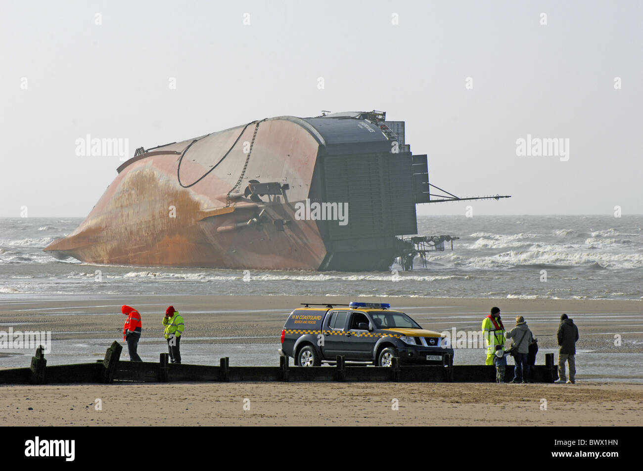 Wreck of ferry run aground on beach, coastguards on beach, MS ...