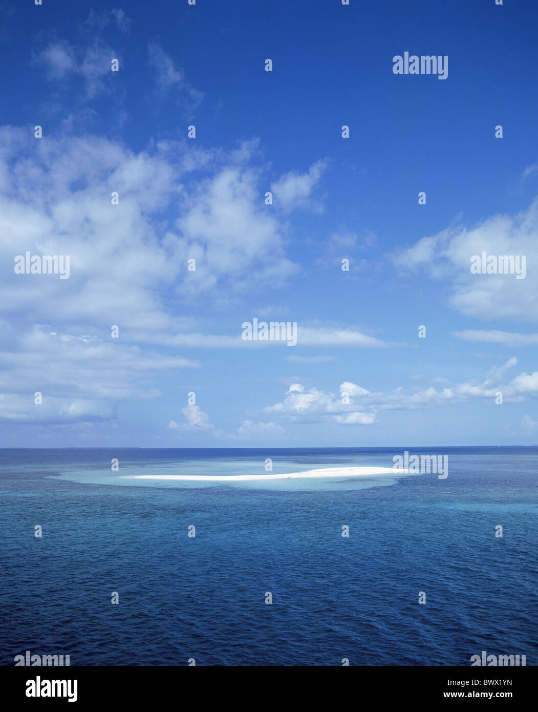 scenery blue sky level island isle sea sand sand bank overview clouds ...