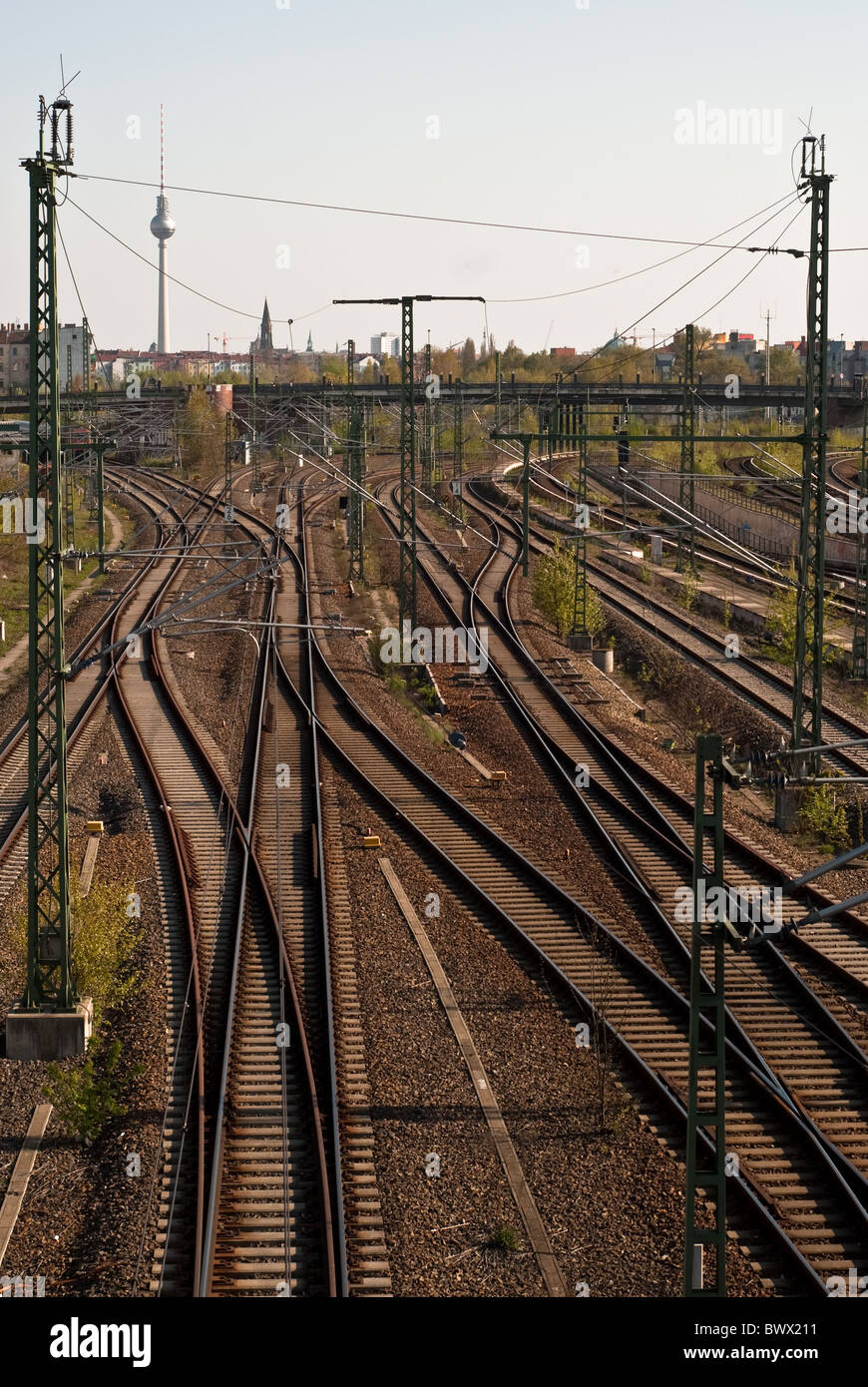 many railroad tracks with the television tower in the background Stock ...