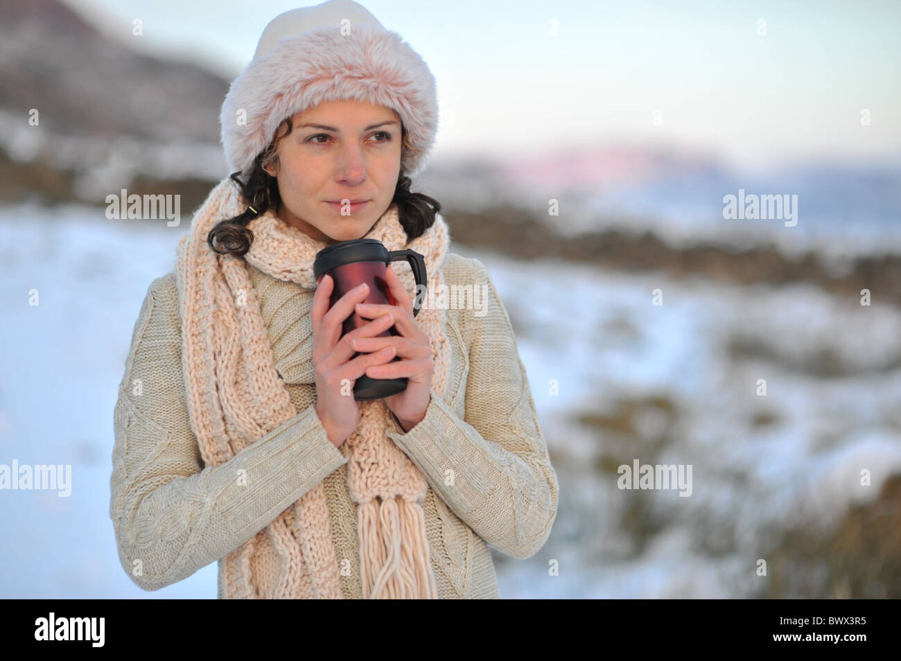 Keeping warm hi-res stock photography and images - Alamy