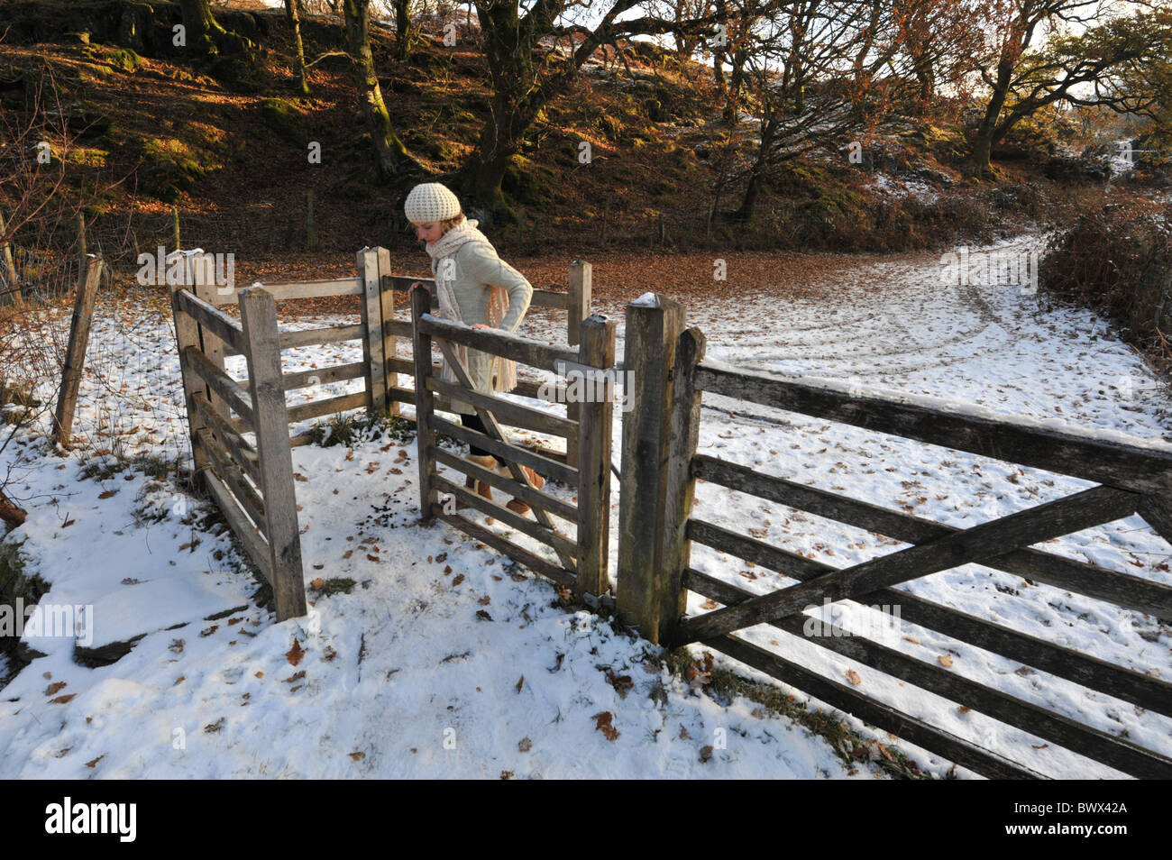woman passing through gate Stock Photo - Alamy