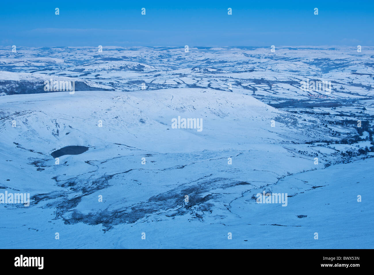 Dawn view of winter landscape from Summit of Pen Y Fan, Brecon Beacons ...