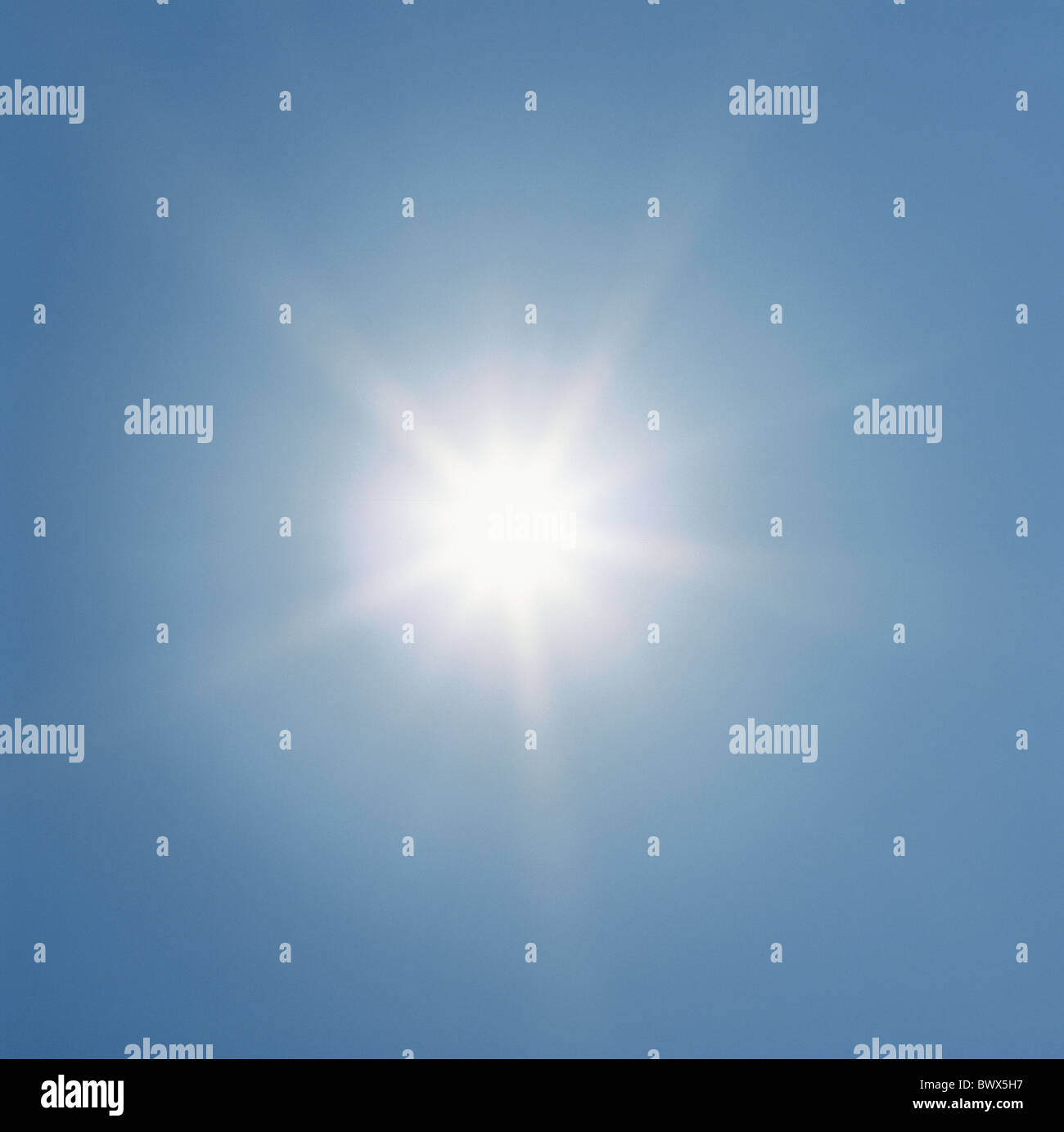 light reflections sun rays beams sky heavens blue Stock Photo - Alamy