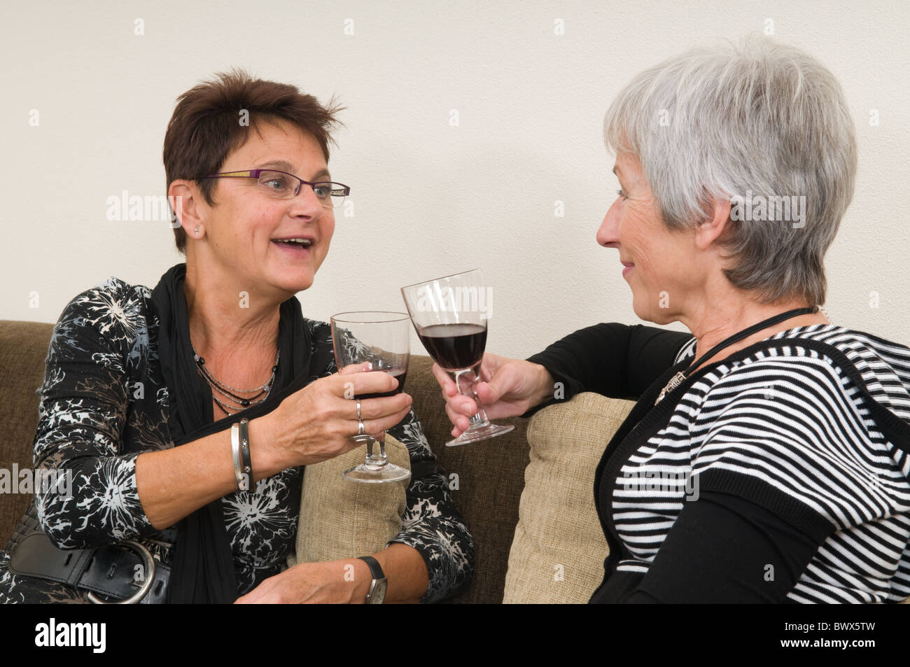Two women having a joyful time together Stock Photo - Alamy