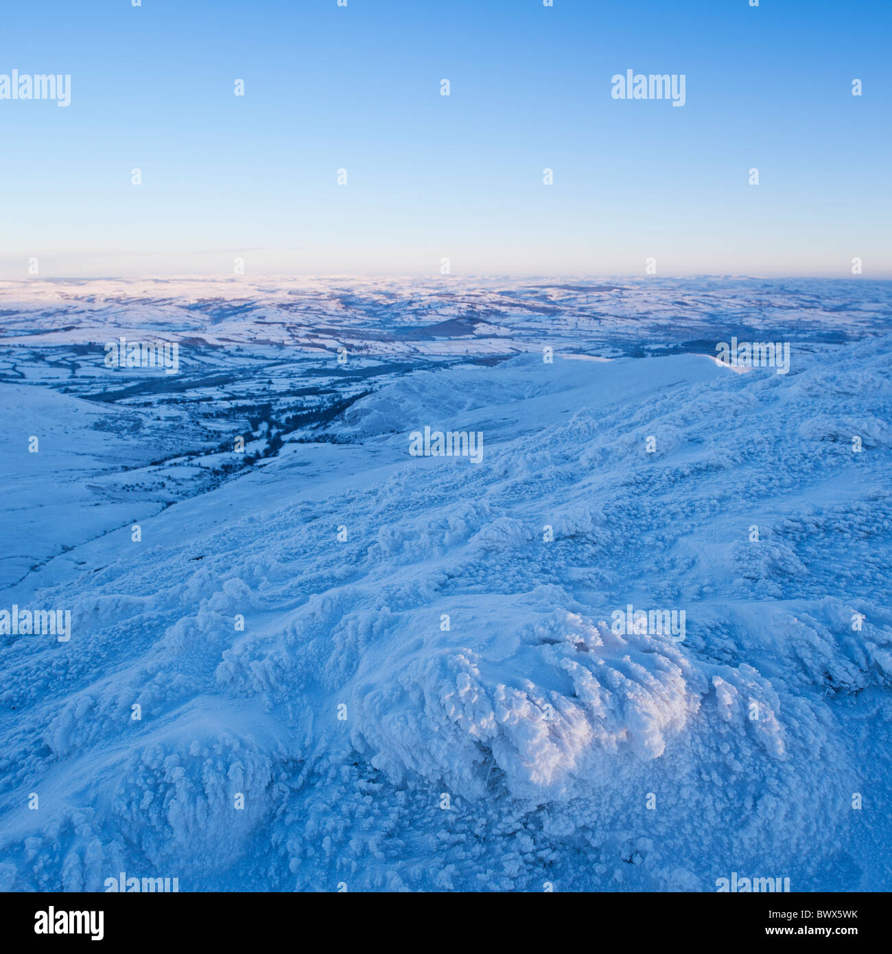 Dawn view of winter landscape from Summit of Pen Y Fan, Brecon Beacons ...
