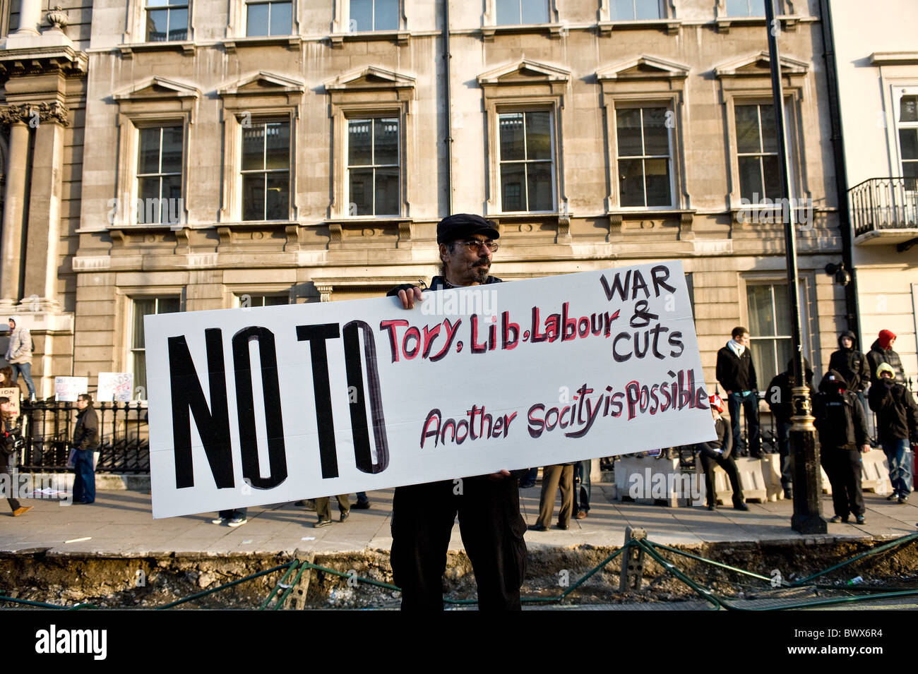 Protester holding placard hi-res stock photography and images - Alamy