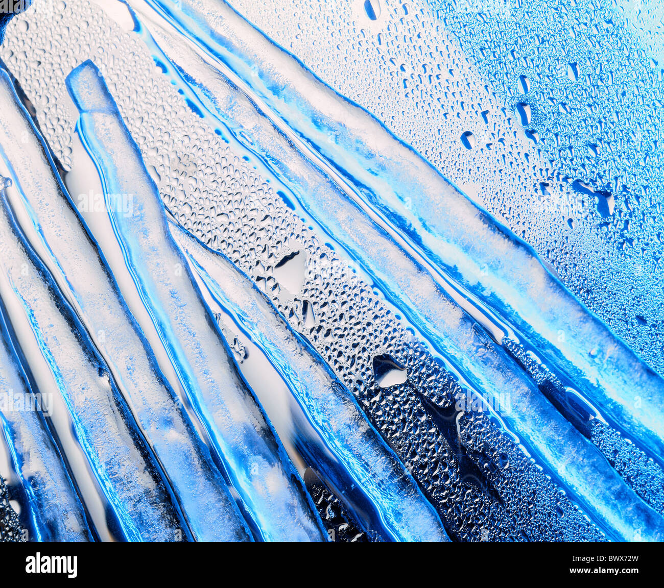 water ice icicle ice sticks studio glass top drop back light cold Stock ...