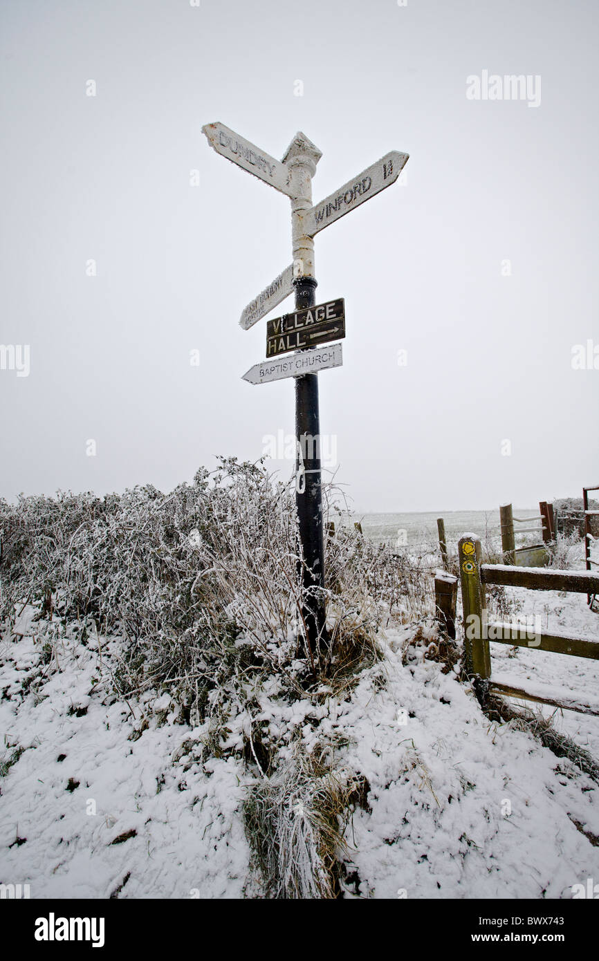 Road sign in snow Stock Photo - Alamy