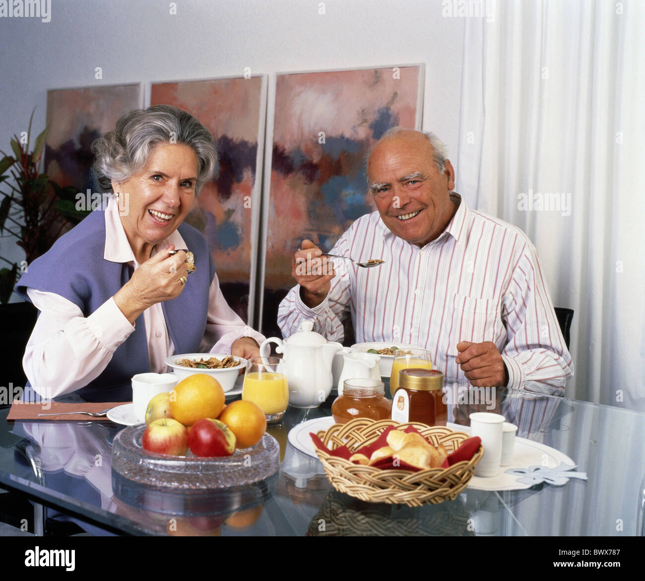 foods breakfast inside person pair couple seniors food eating Stock ...