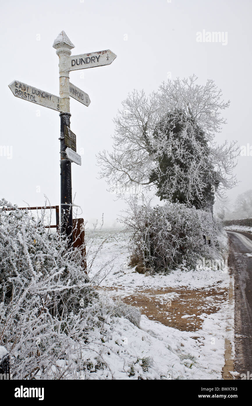 Road sign in snow Stock Photo - Alamy