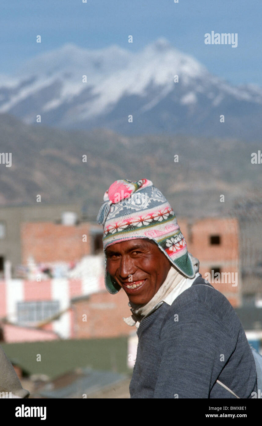 BOLIVIA. NATIVE AYMARA INDIAN WITH MOUNT ILLIMANI IN THE BACKGROUND ...