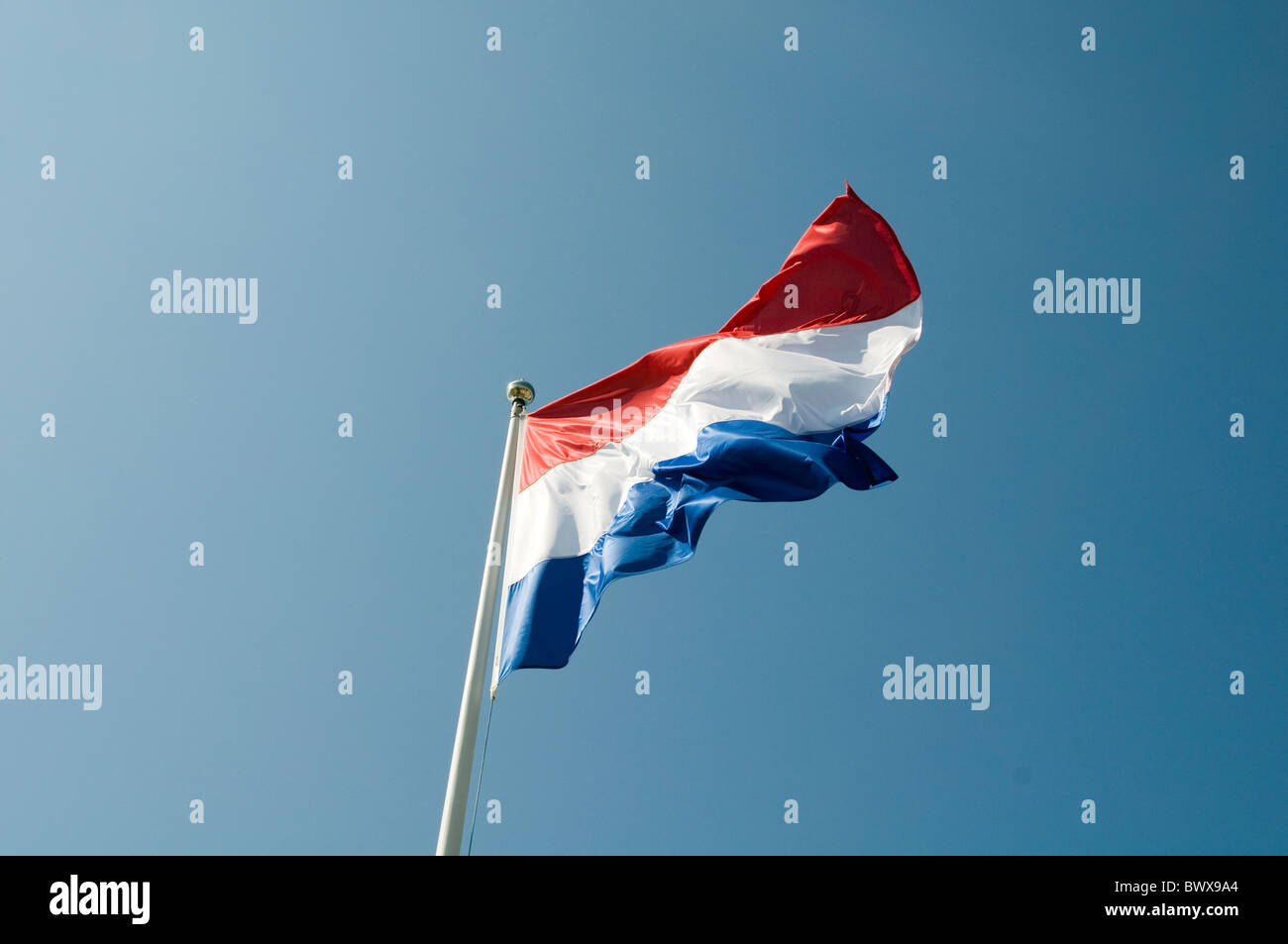 flag flags national pride symbol flutter fluttering in the breeze wind ...