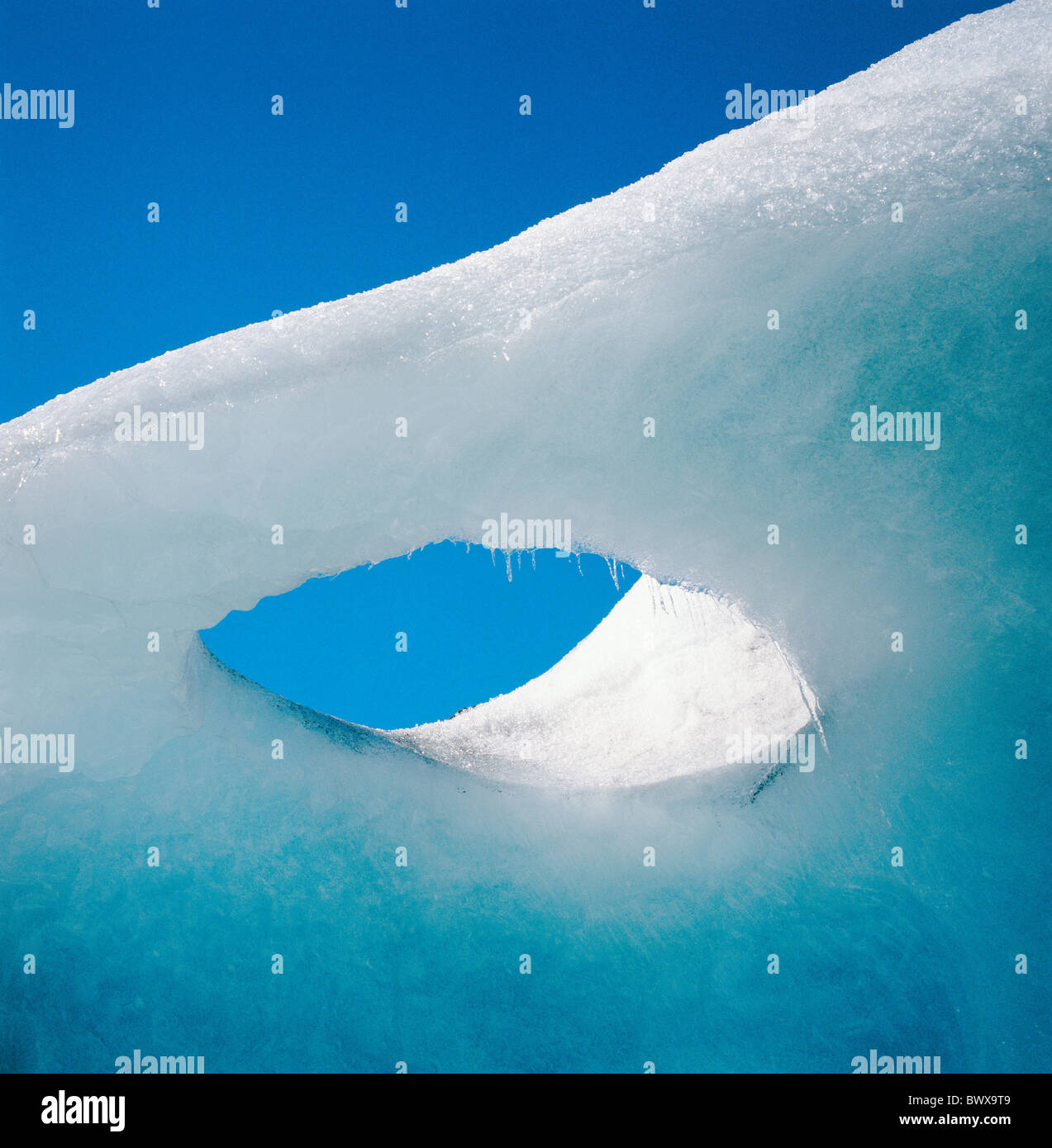 view ice ice ring sky hole winter snow white blue Stock Photo - Alamy