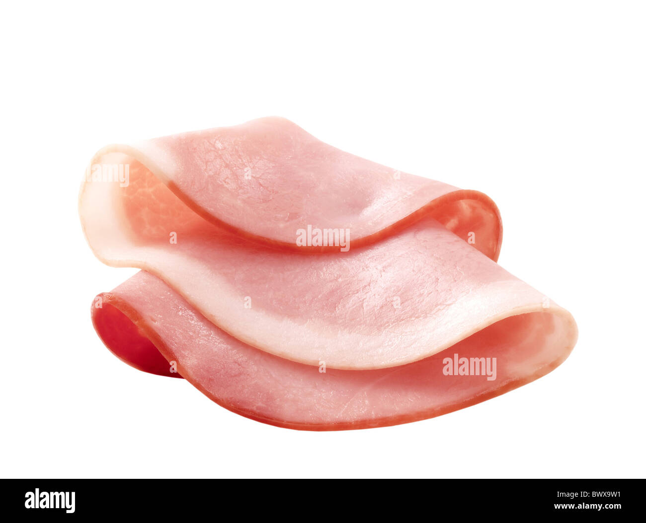 Slice of ham isolated on white background Stock Photo - Alamy