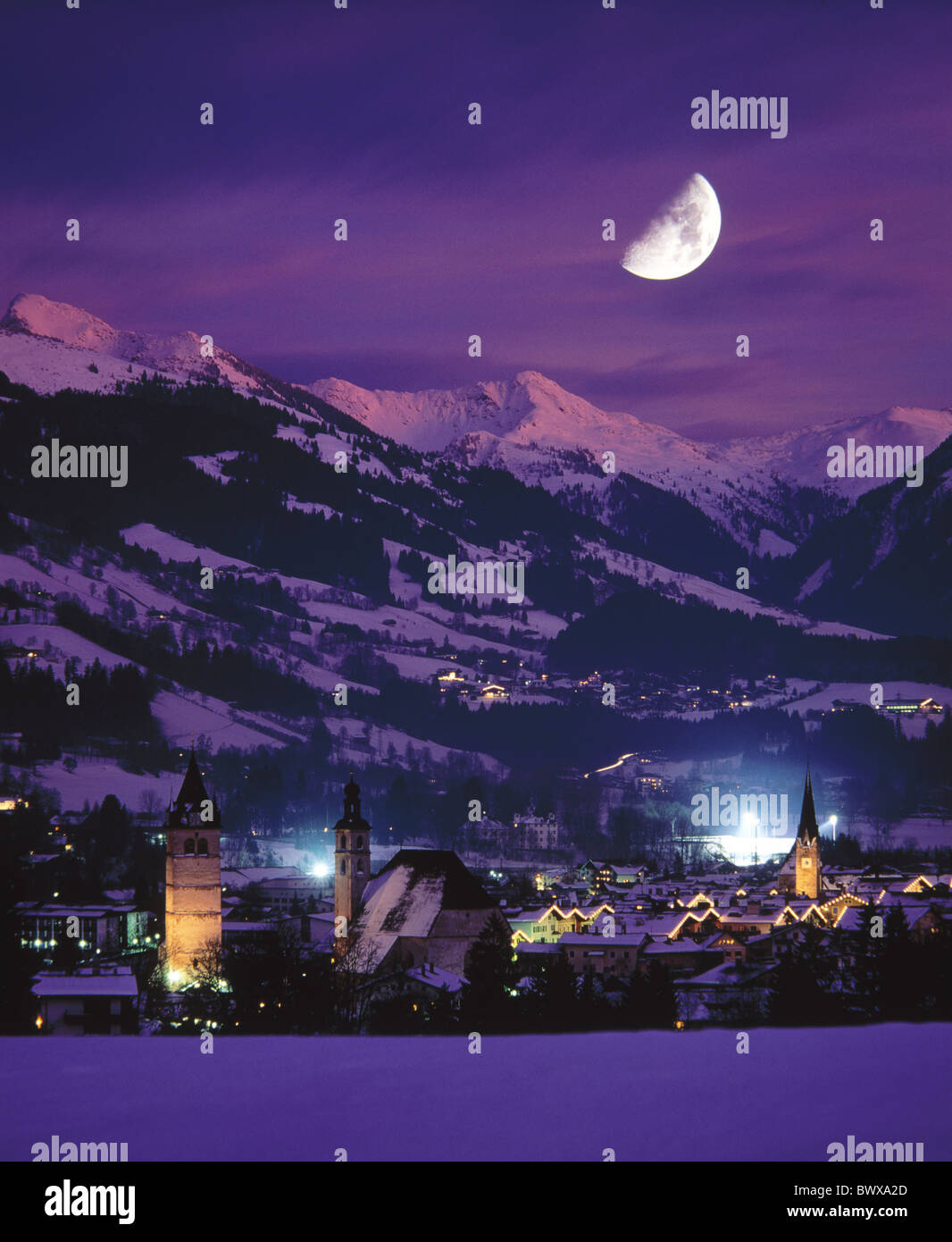 illuminated 10260805 mountains steeples Kitzbuhl moon night Austria ...