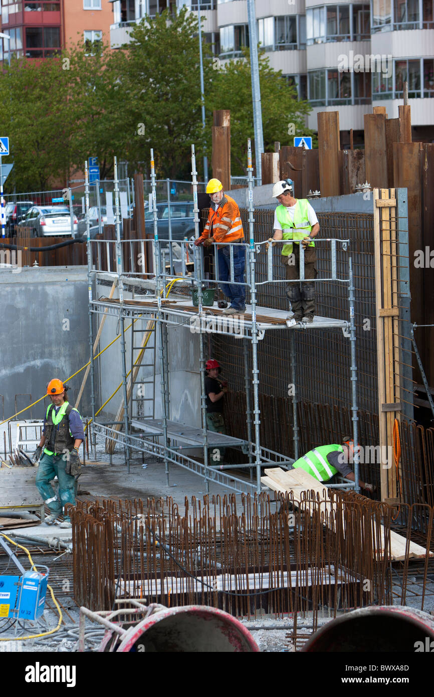 Construction workers in work Stock Photo - Alamy