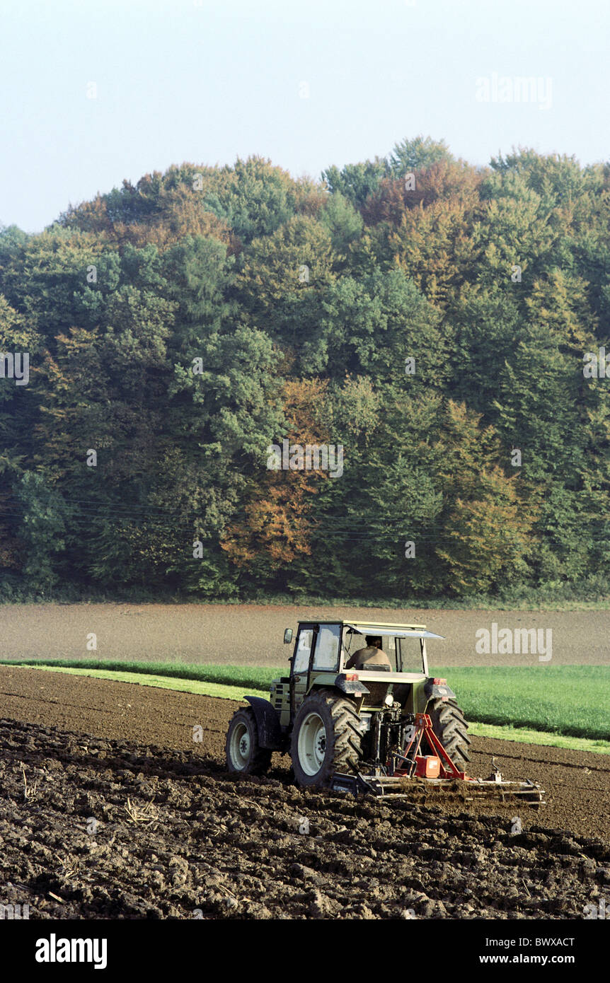 field agriculture plowing by machine tractor wood forest meadow Stock ...