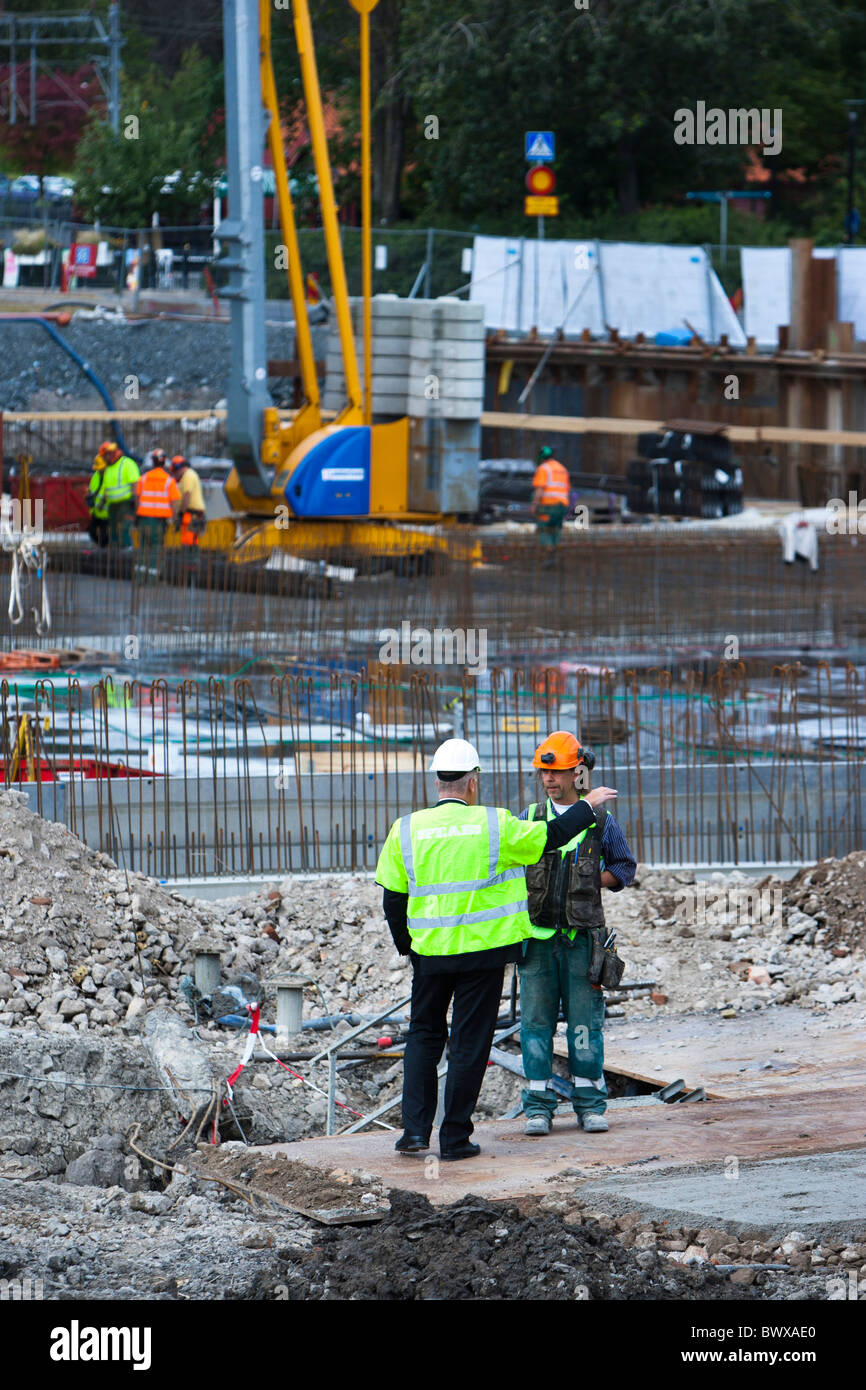Construction workers in work Stock Photo - Alamy