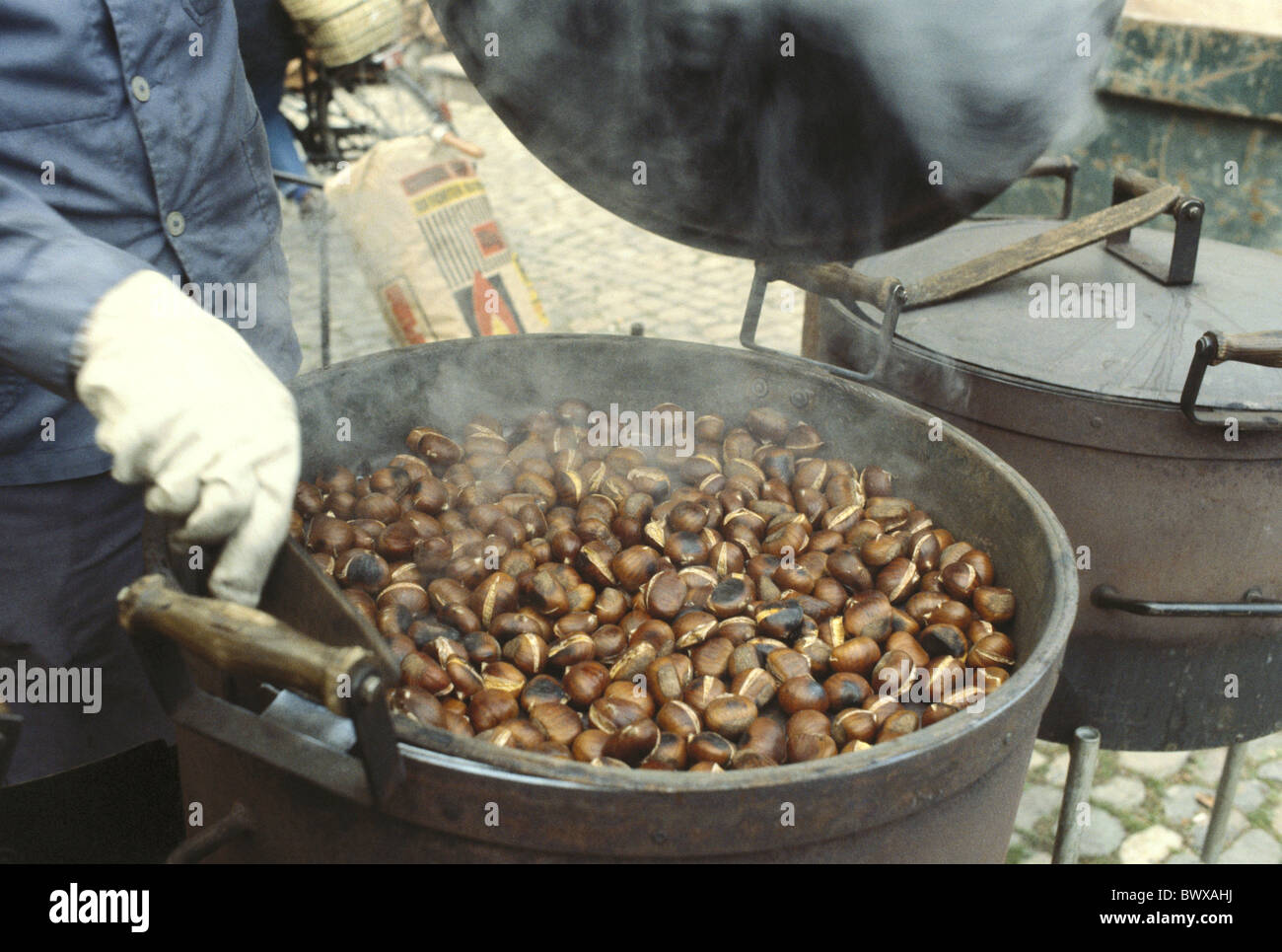 sweet chestnuts chestnuts Food roast lid cast iron pots hand glove ...