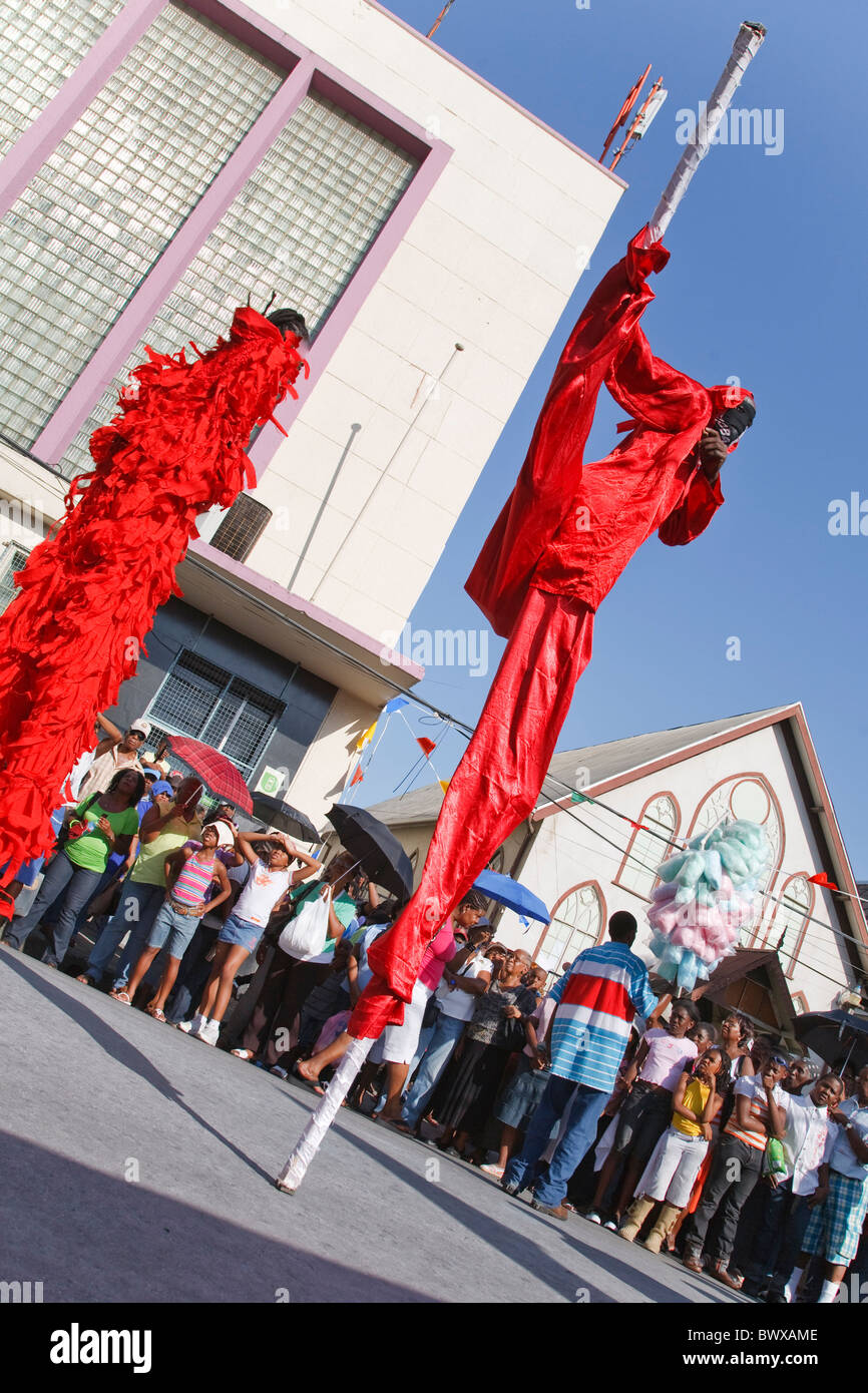 Trinidad Junior Traditional Mas parade - red moko jumbies performing ...