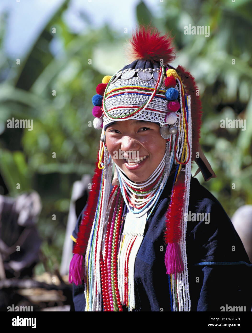 Akha girl mountain tribe child headdress laugh portrait Thailand Asia ...