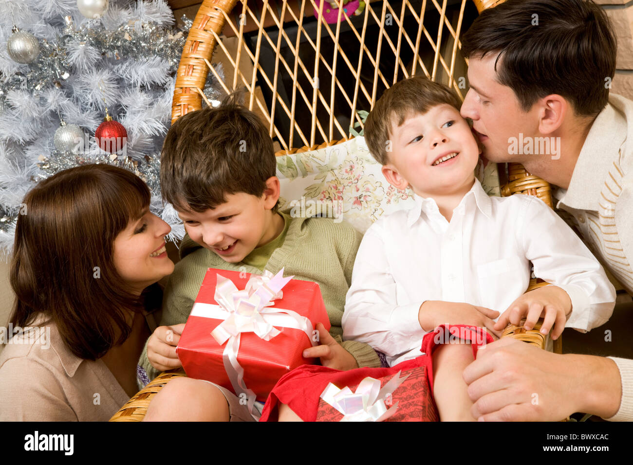 Portrait of happy family having fun while chatting to each other Stock ...