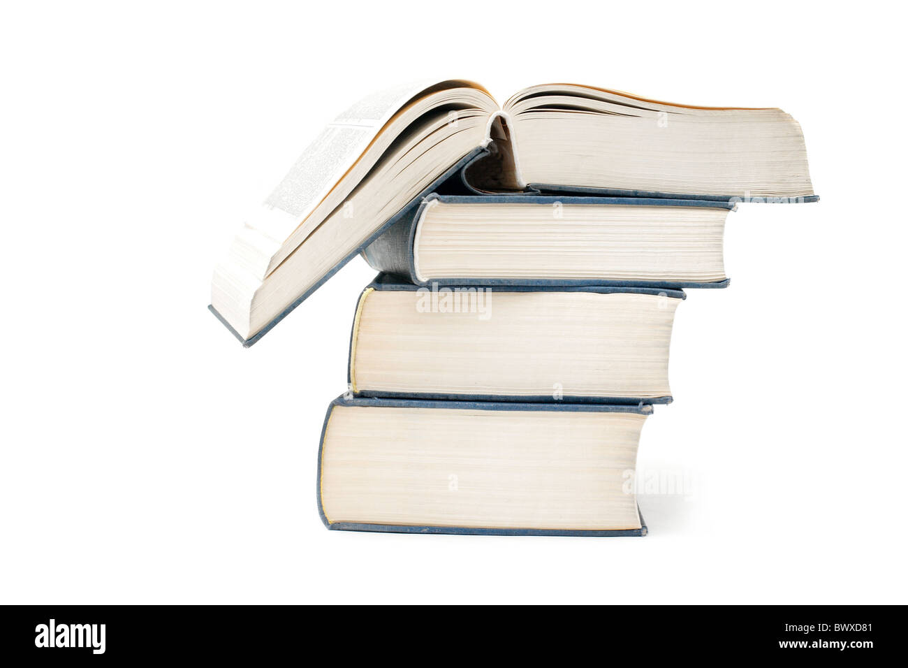 A pile of thick books isolated on a white Stock Photo - Alamy