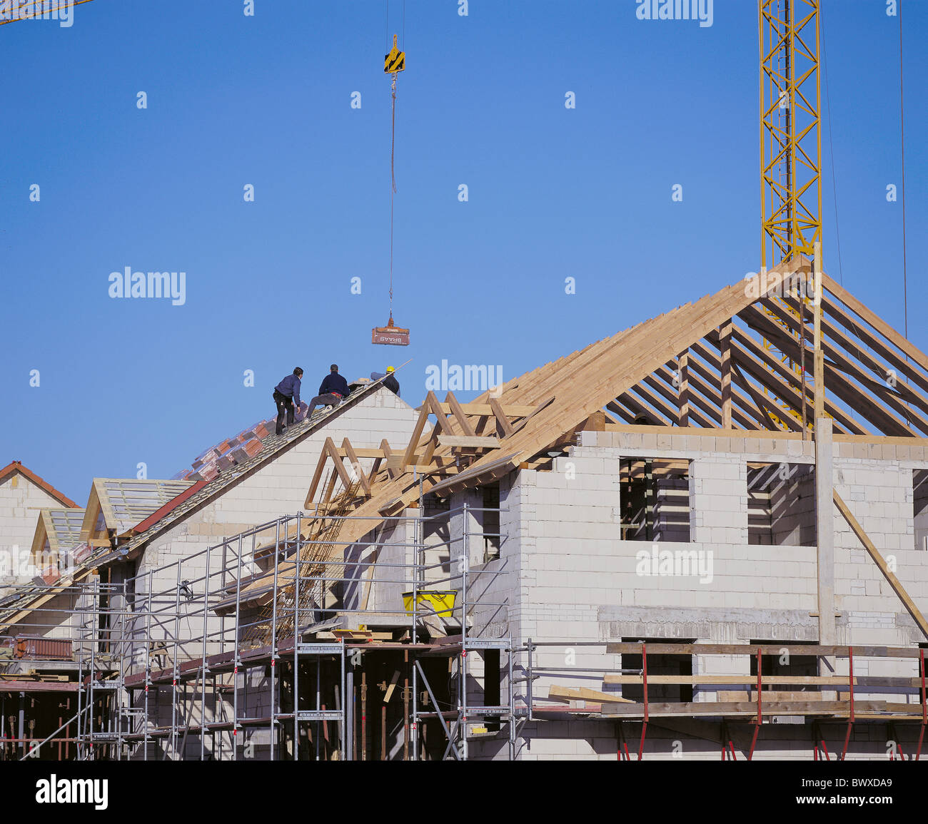 construction roofer roof brick pile large amount roof framework framing ...