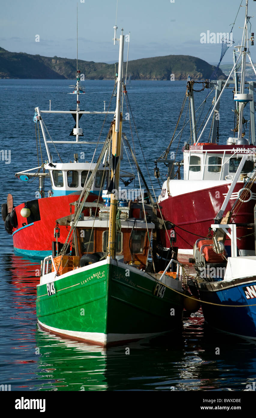Red and green fishing boats alongside at Mevagissey harbour, Cornwall ...
