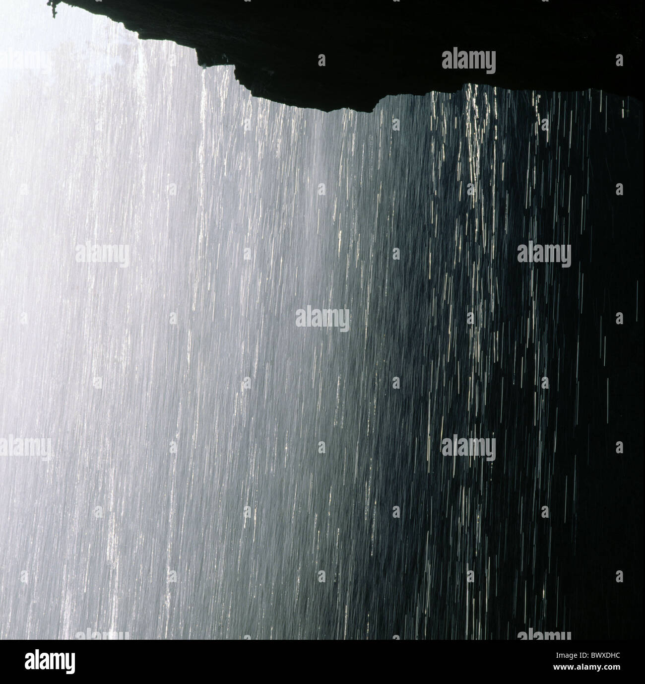 behind curtain light reflections fluorescent drop front waterfall Stock ...