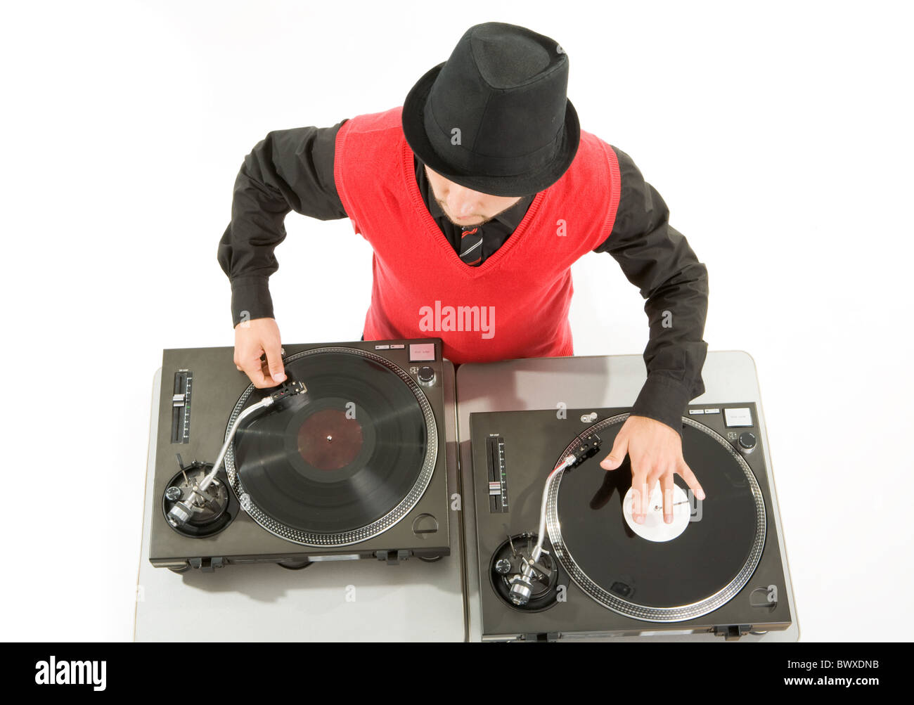 Above view of smart deejay spinning turntables Stock Photo - Alamy